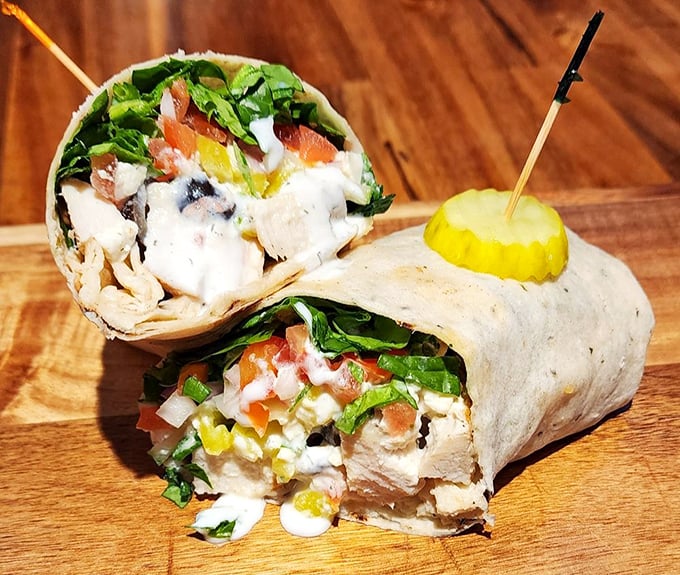 A wrap so perfectly executed it deserves its own highlight reel—fresh veggies and tender chicken playing their positions with championship precision.