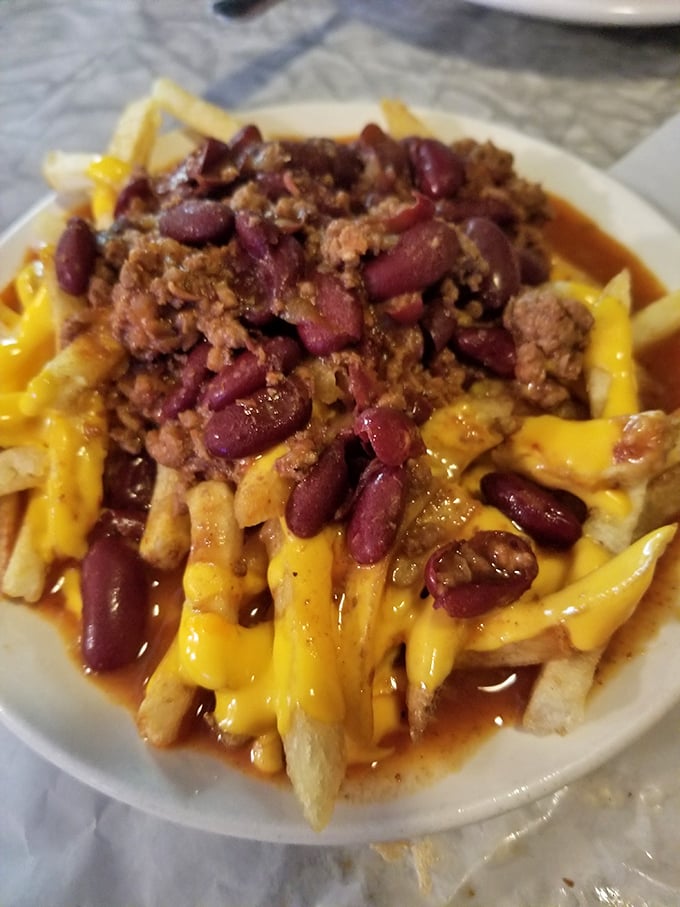 Chili cheese fries that laugh in the face of diet plans and whisper, "Some indulgences are worth every delicious calorie."