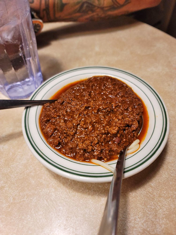 Kroll's legendary chili—hearty, rich, and unapologetically Midwestern—the kind that makes you forget about fancy food and remember what matters.