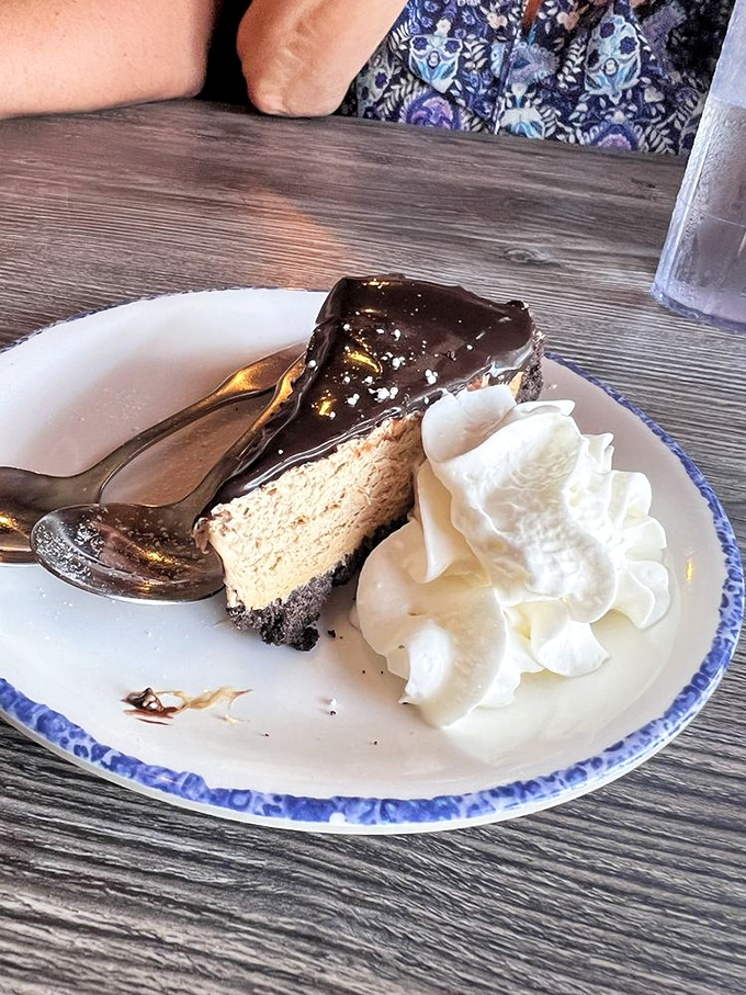A slice of chocolate mousse pie that doesn't just end your meal—it provides the grand finale your taste buds have been waiting for.