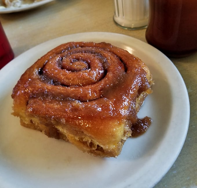 The cinnamon roll—a spiral of morning joy that makes you question why anyone would ever choose a protein shake instead.