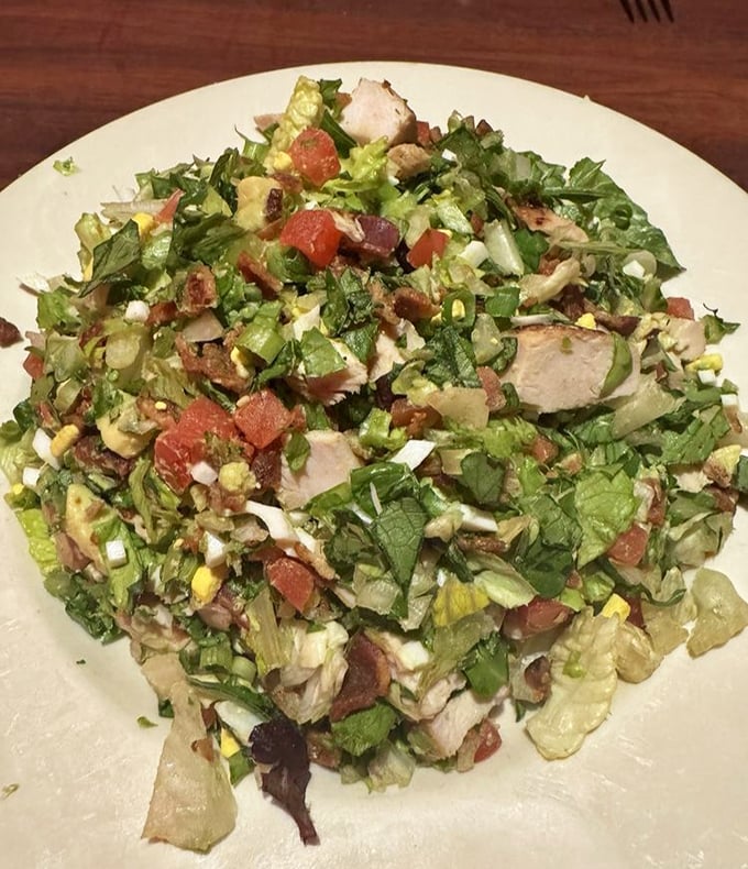 This isn't just a Cobb salad – it's a masterclass in chopped perfection where every ingredient gets equal billing in the flavor symphony.