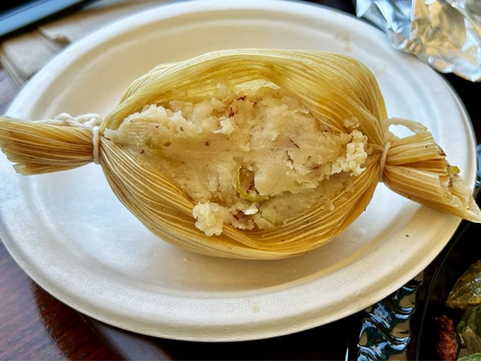 This tamale isn't just wrapped in corn husks – it's wrapped in tradition. A perfect pocket of masa that whispers sweet nothings to your taste buds.
