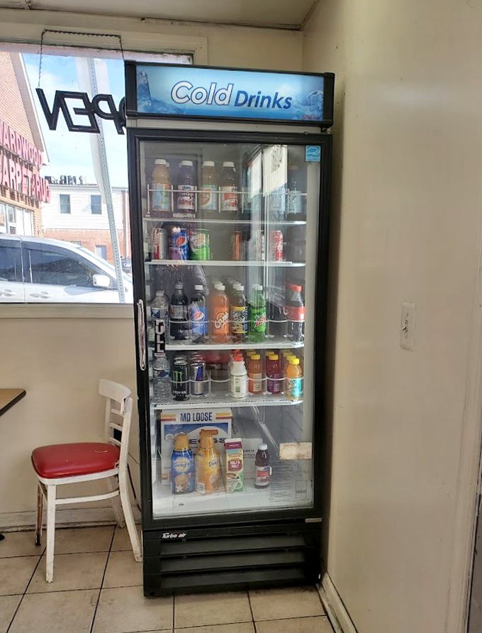 The refrigerator case—a hydration station stocked with the colorful array of beverages necessary to wash down Maryland's most satisfying donuts.