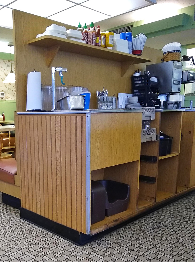 The condiment station—where ketchup, mustard, and napkins stand ready like loyal soldiers in the battle against hunger.