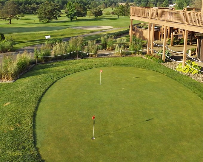 This putting green offers a gentler landscape than the rugged oil fields that made the region famous—from crude oil to manicured greens.