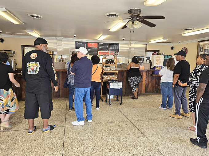 The line forms early and with good reason. These folks aren't just waiting for lunch—they're queuing for a taste of North Carolina heritage.