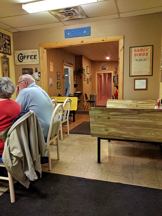 Wood paneling and cheerful signs create the perfect backdrop for morning rituals—like stepping into your favorite aunt's kitchen, if she could cook this well. 