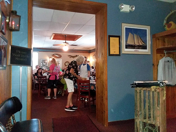 Happy diners enjoying their maritime feast in an atmosphere that makes every meal feel like a special occasion.