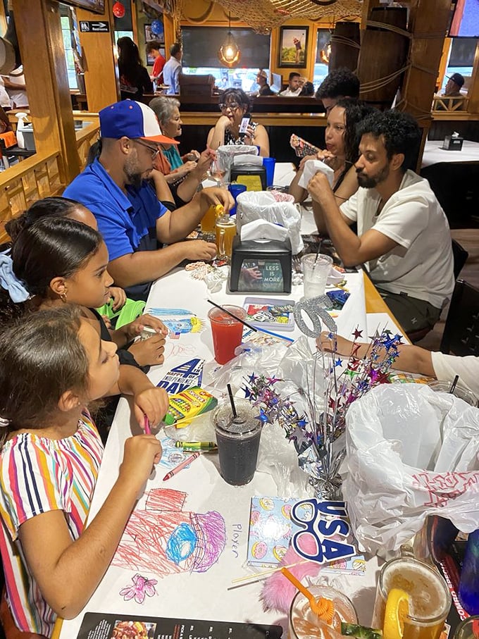 Family-style dining where crayons and seafood create memories—because the best conversations happen over paper-covered tables.