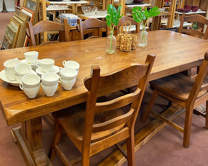 This solid wood dining table has hosted countless family meals and is ready for yours. Those white mugs are just begging for Sunday morning coffee.