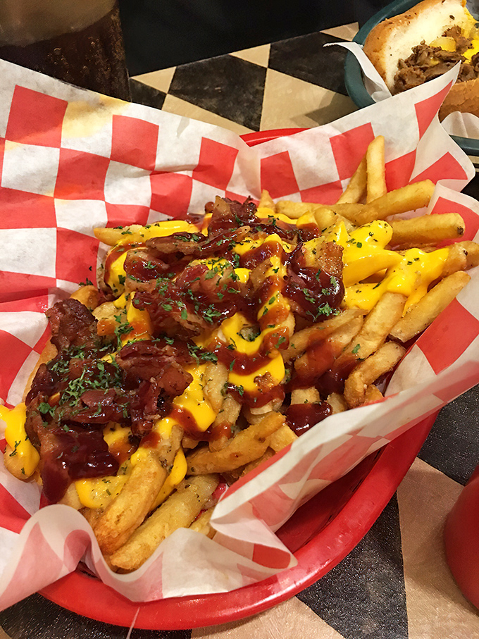 Fries that refused to be ordinary. Topped with cheese, bacon, and sauce, they've achieved what most side dishes only dream about.