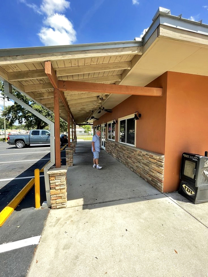 The covered walkway – your last chance to compose yourself before entering a place that will redefine your barbecue standards forever.