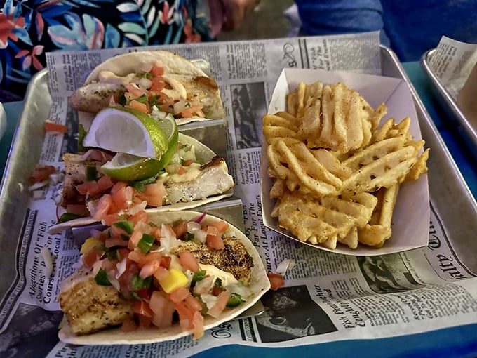 Fish tacos topped with fresh pico de gallo – proof that sometimes the simplest combinations create the most memorable flavors.