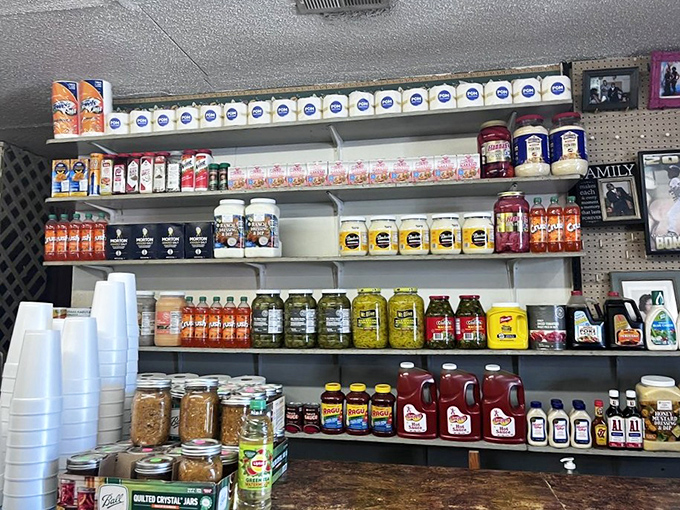 The pantry shelves tell a story of homemade preparations. Those jars aren't just condiments – they're liquid gold waiting to elevate your meal.