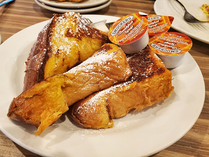 French toast that makes breakfast feel like dessert. Golden, crispy edges give way to custardy centers—a morning indulgence worth setting the alarm for.