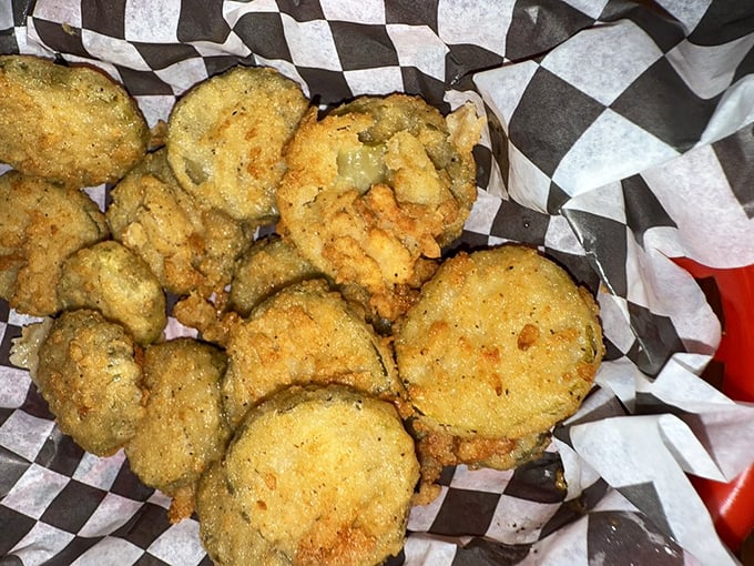 Fried pickles that achieve the impossible: maintaining their crunch while delivering that perfect vinegary tang. A masterclass in simple pleasures.