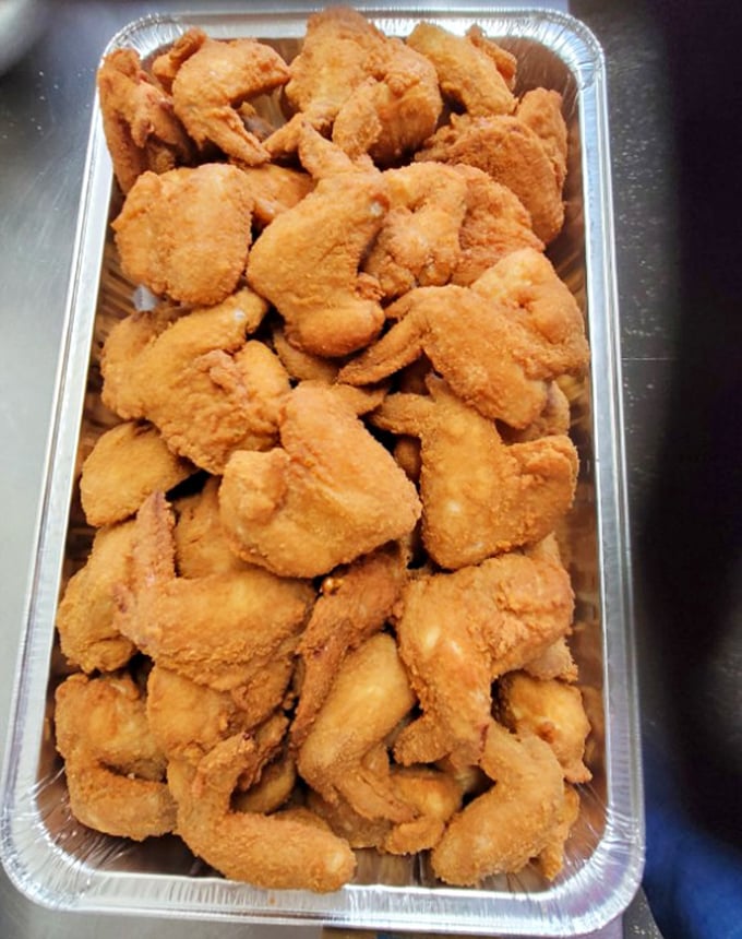 Not so much fried chicken as chicken that has achieved its highest purpose. This tray contains more happiness than most people's vacation photos.