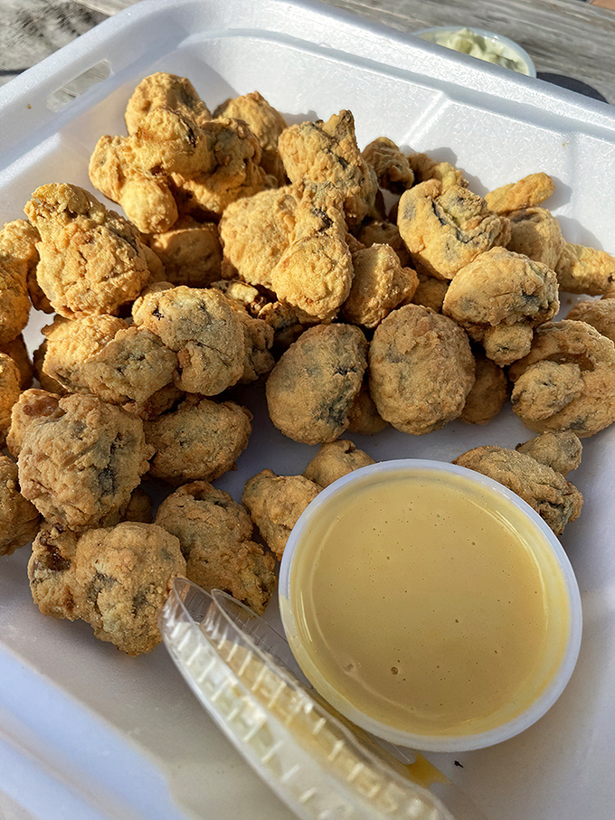 Fried mushrooms with dipping sauce—proof that Essex's fryer magic extends well beyond the treasures of the sea.
