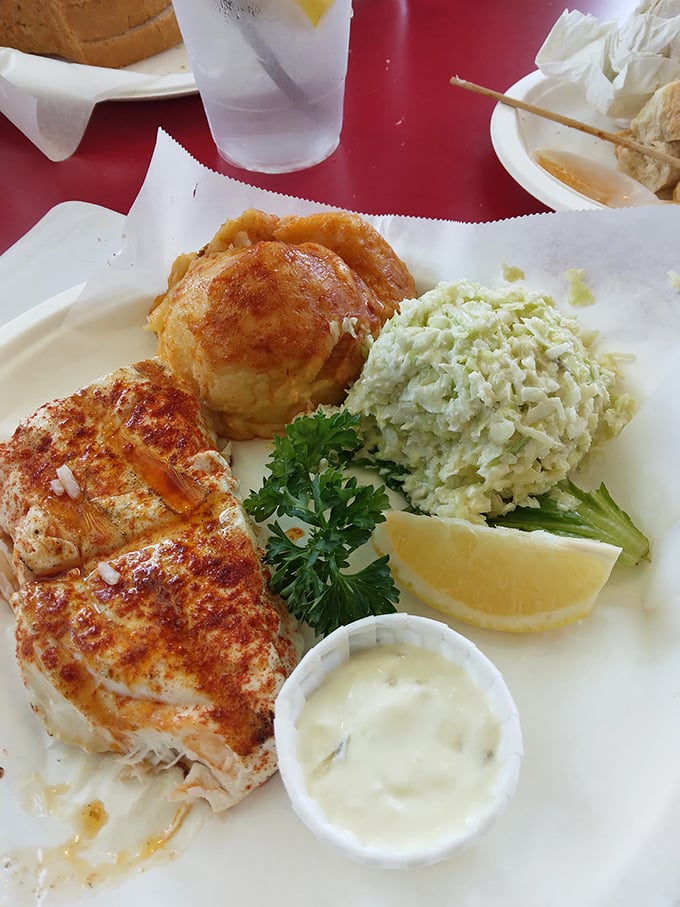 This isn't just fish and coleslaw—it's a perfectly executed plate of happiness where each component plays its part in seafood harmony.