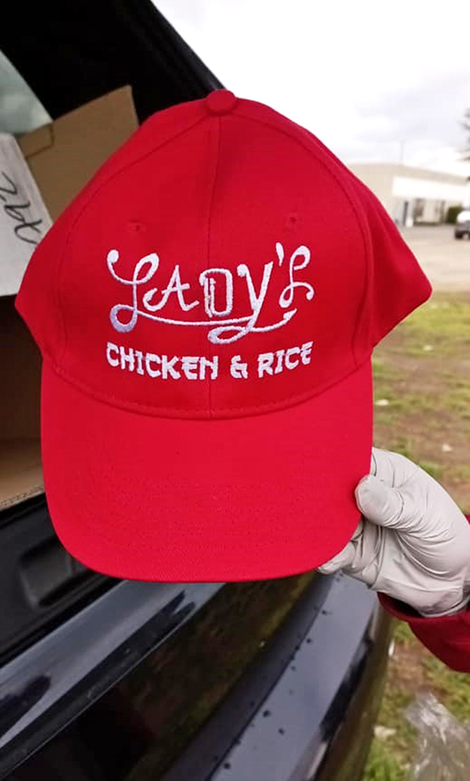 The red cap—a badge of honor for true fans who want to spread the gospel of Lady's Chicken & Rice wherever they roam.