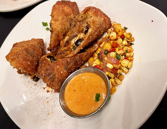 These aren't your average egg rolls—they're crispy Texas ambassadors filled with savory surprises and served with a sauce worth bottling.