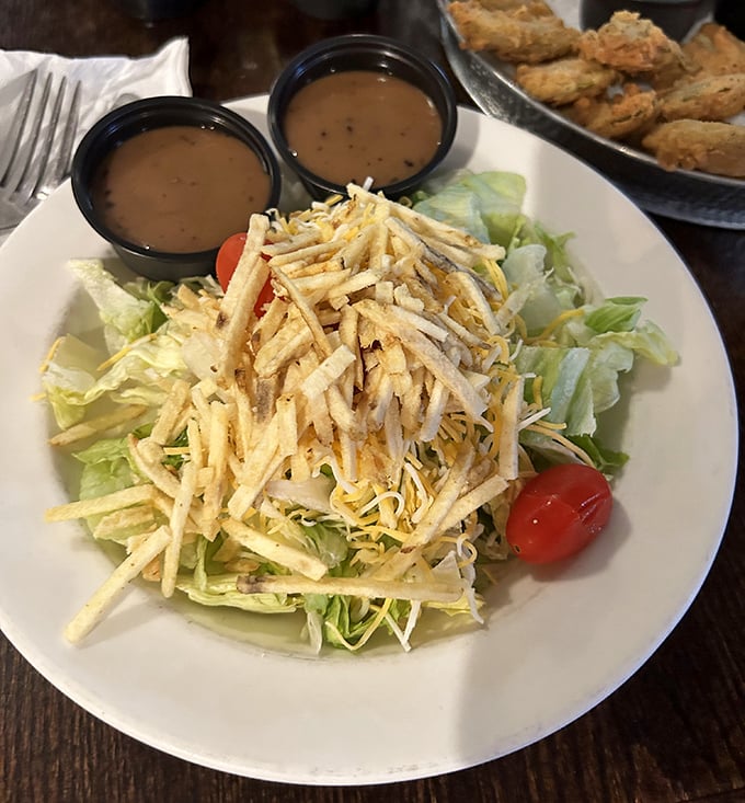 A salad that doesn't apologize for being exactly what it is – fresh, crunchy, and topped with enough fried tortilla strips to make it fun.