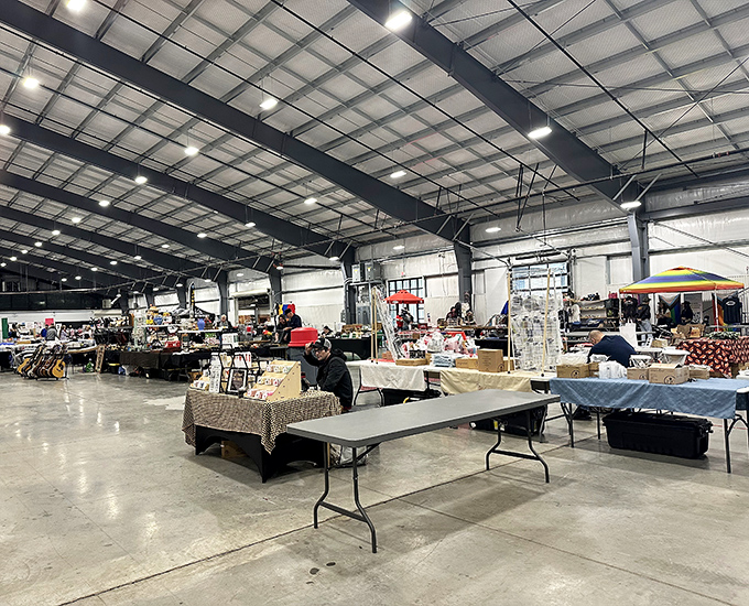 The cavernous indoor space houses vendors of every stripe. Under fluorescent lights, the serious business of treasure hunting continues regardless of weather.