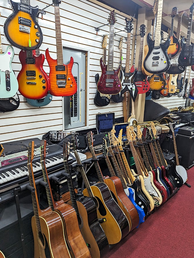 Guitar heaven for musicians and dreamers alike. Each instrument hanging here contains a thousand songs waiting to be played.