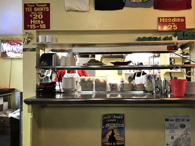 Behind the counter where magic happens. Simple equipment, extraordinary results—proof that passion trumps fancy kitchen gadgets every time.