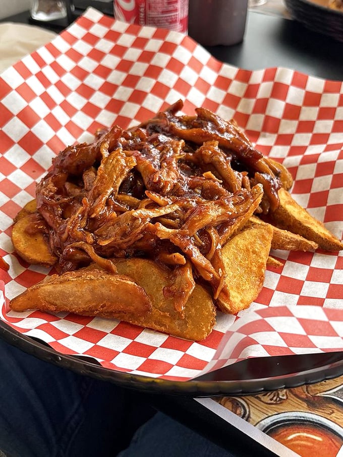 Pulled pork atop golden potato wedges—a BBQ summit meeting where everyone gets along deliciously.