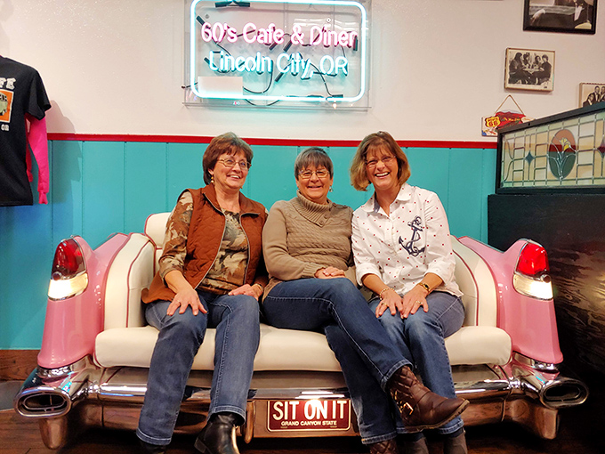 The Cadillac couch isn't just seating – it's a photo op with tail fins. "Sit On It" the sign commands, and who am I to argue with such sound advice? P
