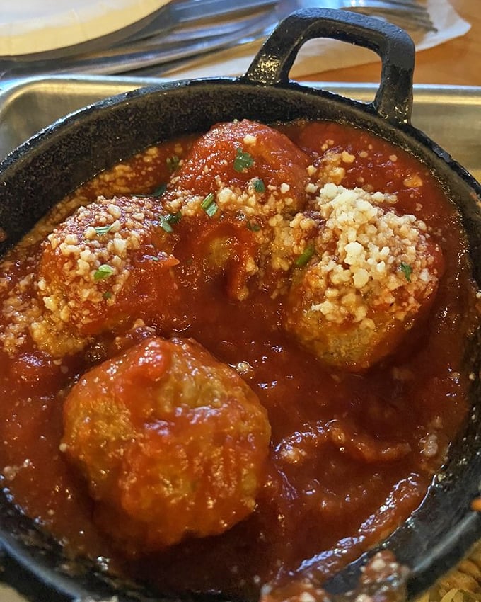 These meatballs aren't just food; they're time machines to your Italian grandmother's kitchen—even if you never had an Italian grandmother.