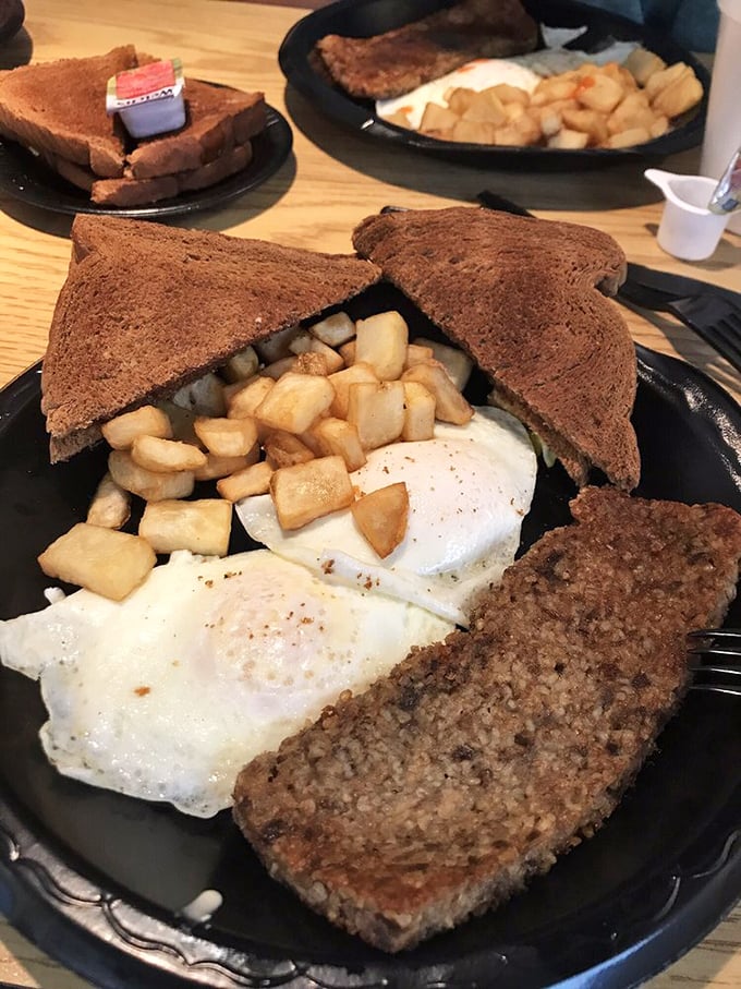 Breakfast of champions – farm-fresh eggs, home fries, and meatloaf that makes you question why you don't eat meatloaf for breakfast more often.