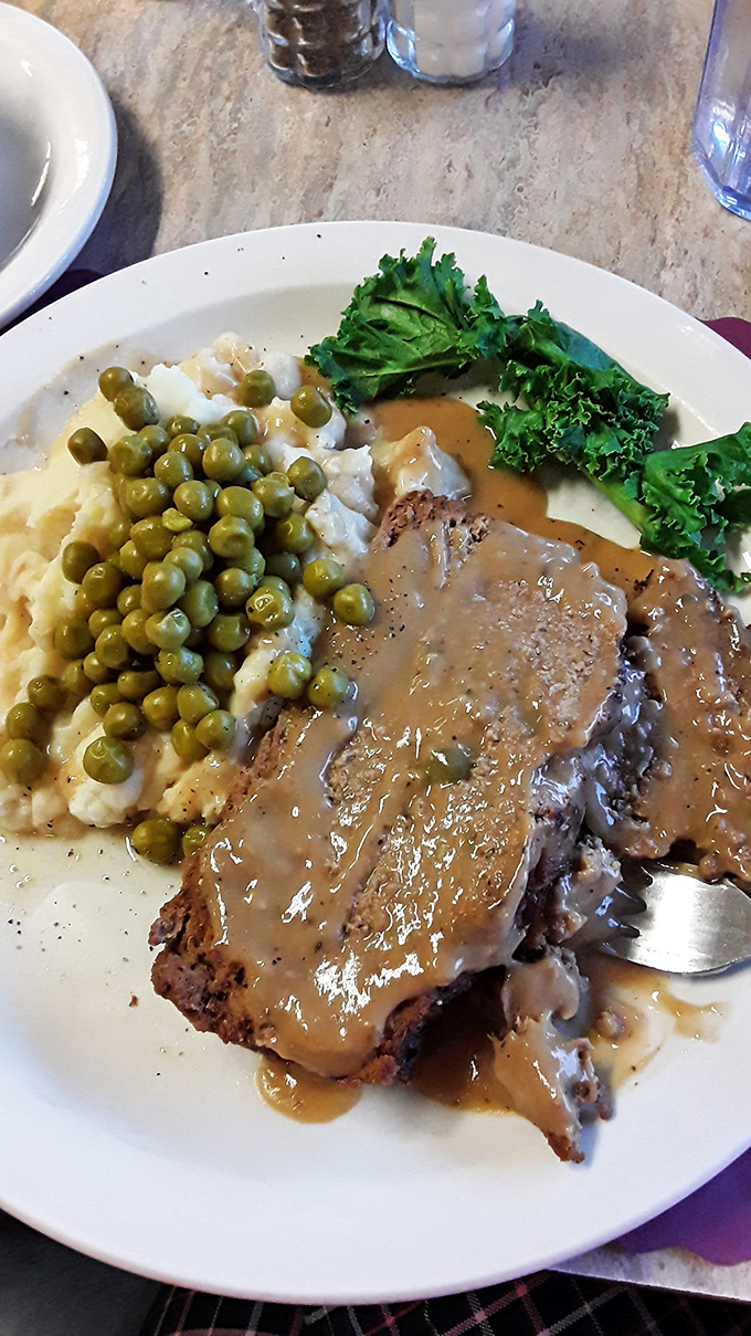 Meatloaf with gravy—the dish that reminds you why comfort food earned its name. No deconstruction or reimagining needed, just pure satisfaction.