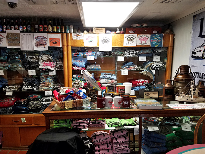 The merchandise corner – because nothing says "I conquered the crab feast" like a t-shirt that might not fit after your meal.