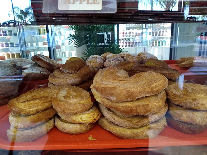 Stacked higher than your weekend reading pile, these flaky pastries promise buttery bliss with every bite. Mexican carb heaven awaits.