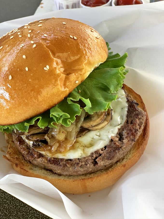 The mushroom and Swiss burger glistens with promise—a perfect marriage of earthy and creamy that makes other sandwiches jealous.