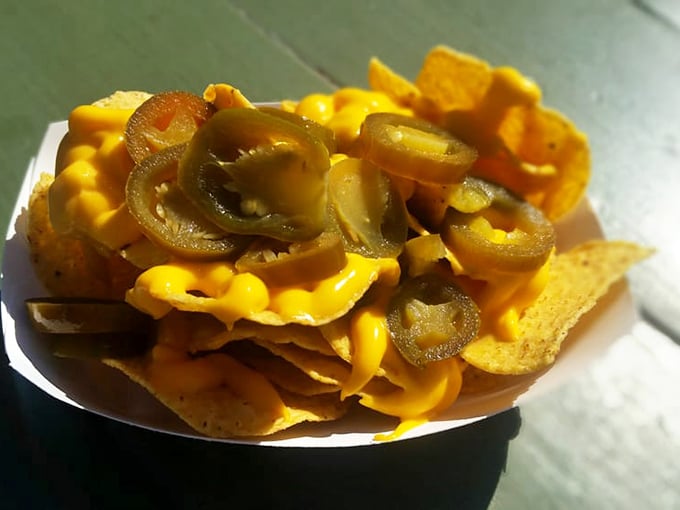 Nachos with jalapeños that don't just sit there looking pretty—they demand your immediate and undivided attention. Challenge accepted.