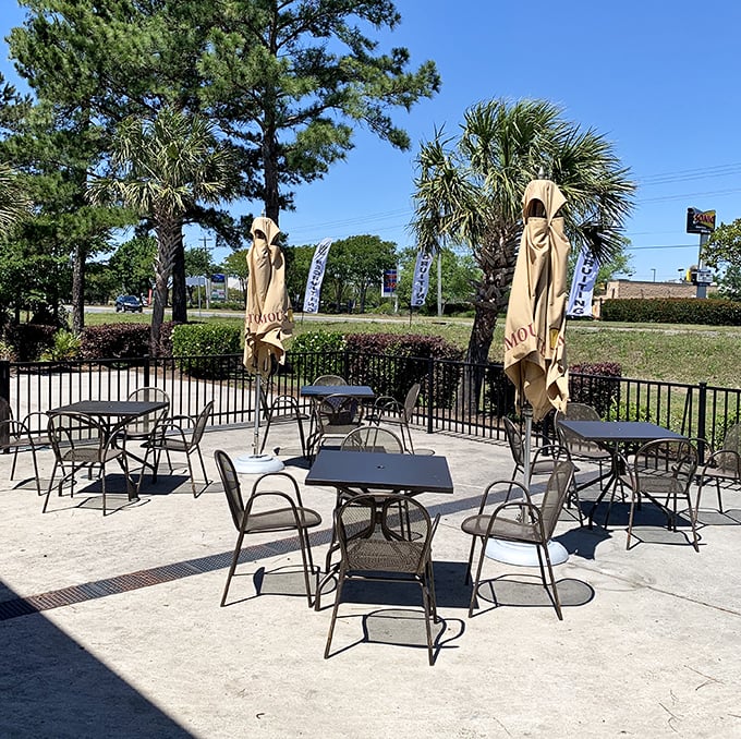 The outdoor patio offers al fresco dining under Carolina skies—because sometimes breakfast tastes better with a side of vitamin D.