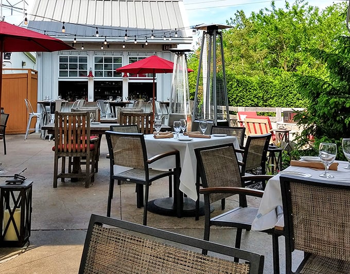 Outdoor dining that makes you wonder why we ever eat inside. Those heat lamps aren't just for warmth—they're deadline extenders for perfect evenings.