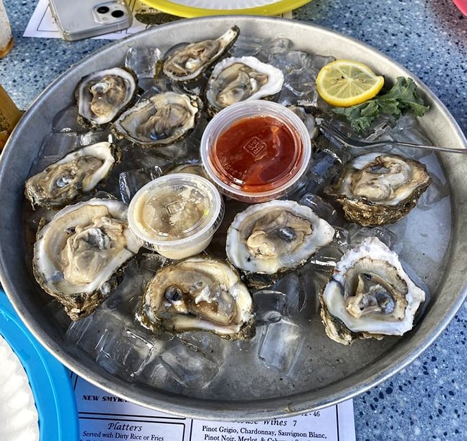 The seafood lover's dream platter – where shrimp, clams, and corn come together like the world's tastiest beach party. Tools provided, appetite required.