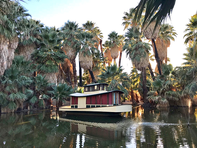 This desert oasis complete with houseboat feels like a mirage—but the palm reflections in still waters confirm you haven't been in the sun too long.