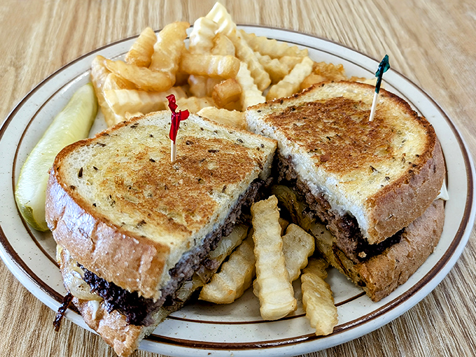A patty melt that's achieved the perfect balance between crispy bread, melty cheese, and juicy beef—the holy trinity of sandwich perfection.