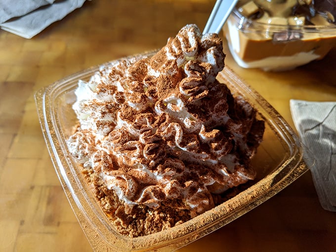 This cinnamon-dusted mountain of whipped cream isn't just dessert—it's architecture with a cherry on top.