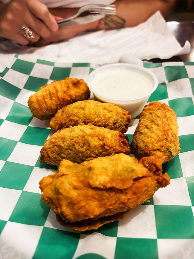 These golden-fried delights aren't just appetizers—they're conversation stoppers that demand your full attention and respect.
