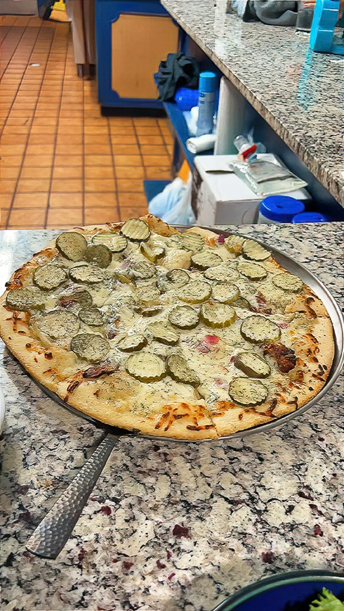 Pickle pizza—the controversial conversation starter that converts skeptics into evangelists. A crispy, cheesy canvas for briny brilliance.