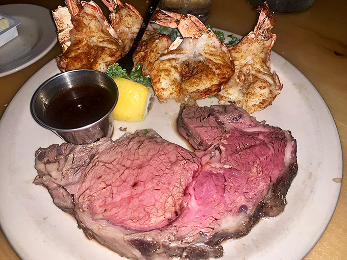 Surf meets turf in perfect harmony. Medium-rare prime rib alongside golden prawns—proof that some of life's best relationships are opposites.