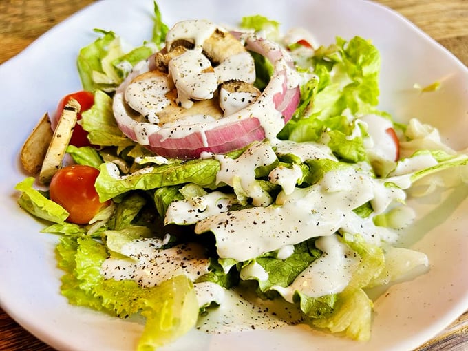 A ranch salad that proves vegetables can hold their own in a steakhouse—fresh, vibrant, and dressed with just the right amount of creamy goodness.