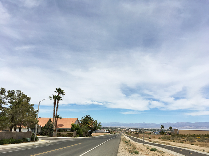 Desert roads that promise adventure around every curve, with vistas so expansive they make your problems seem appropriately tiny by comparison.